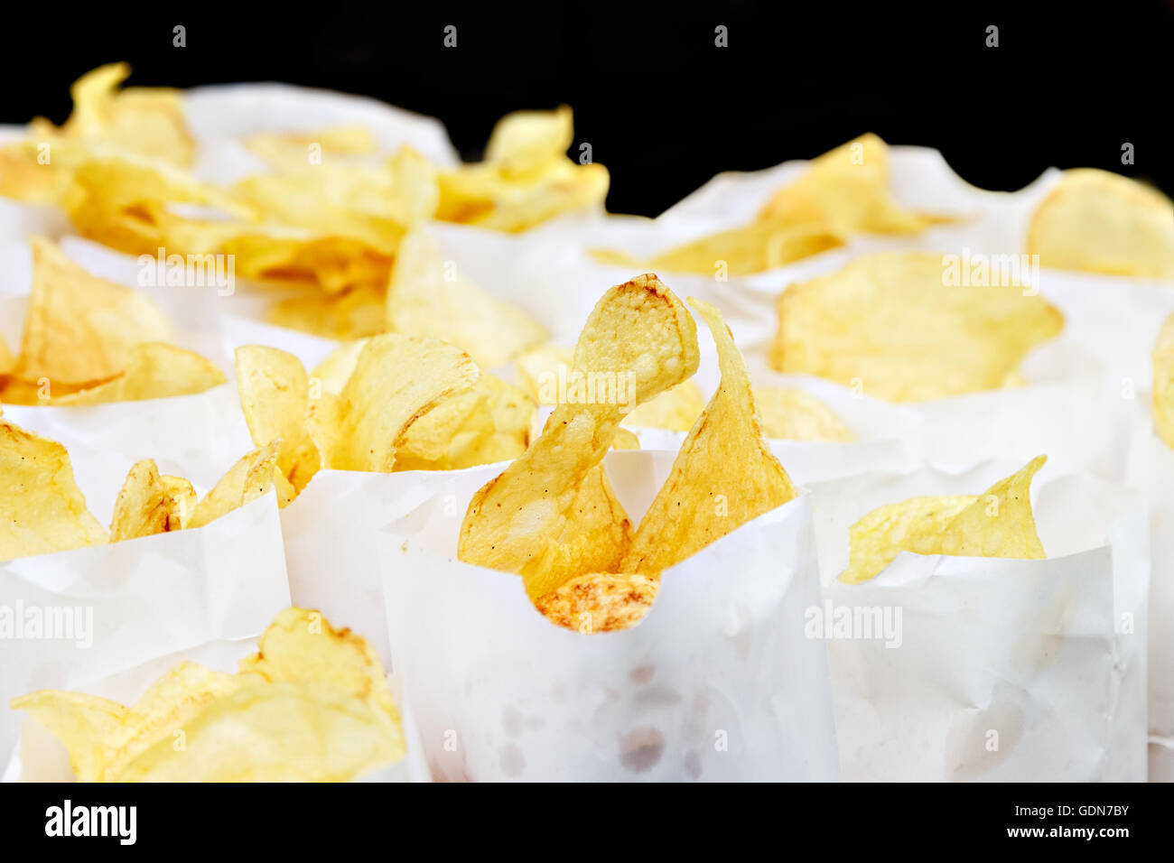 Traditional potato chips on a craftsman market.Horizontal image Stock ...