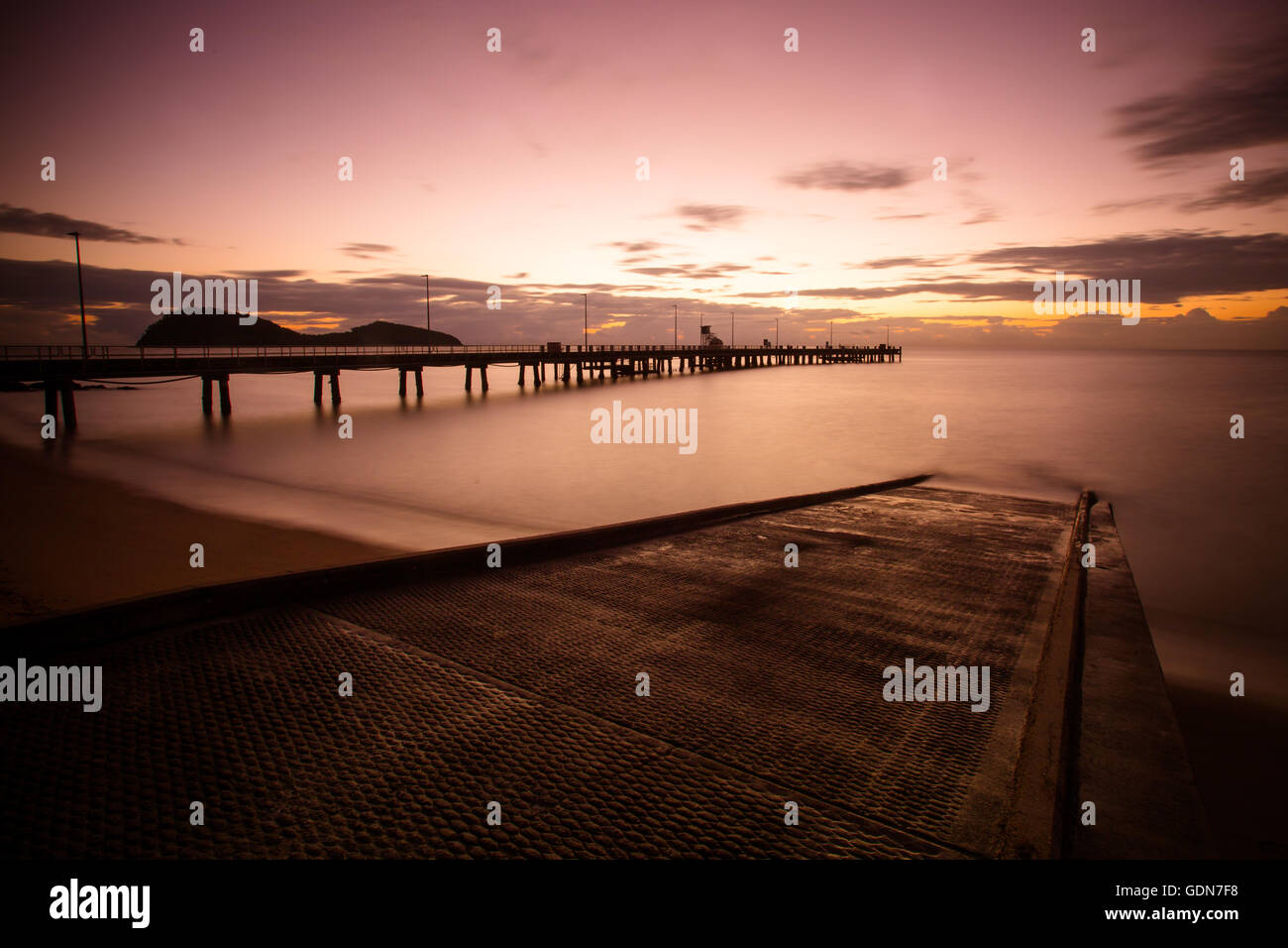 The iconic Palm Cove jetty and boat ramp at sunrise on a winter's ...