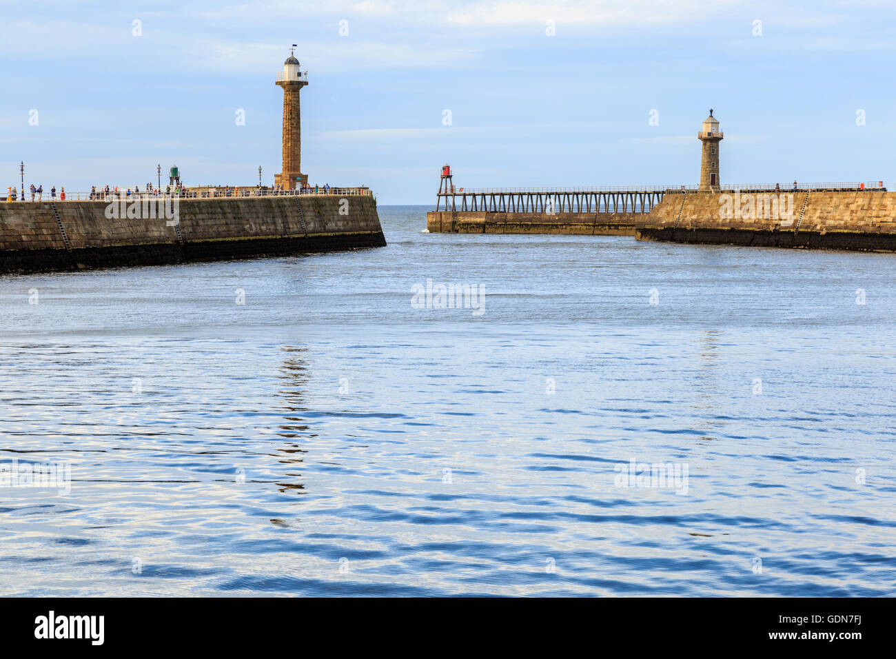 The West Lighthouse (left of image) and the East Lighthouse. In Whitby ...