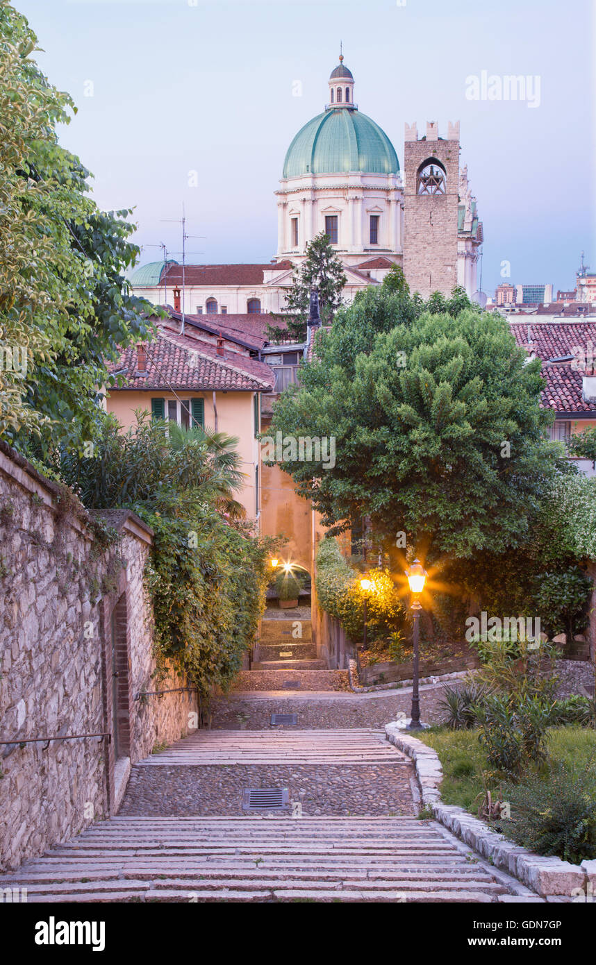Brescia - The Duomo cupola over the stairs of old town in the morning ...
