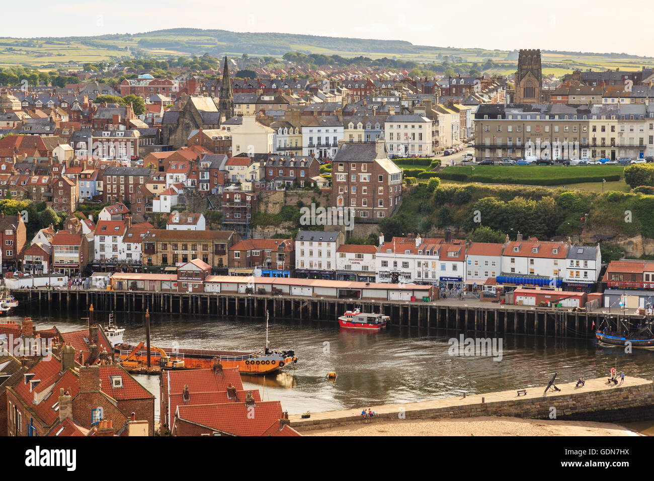 Whitby harbour, and town behind Stock Photo - Alamy