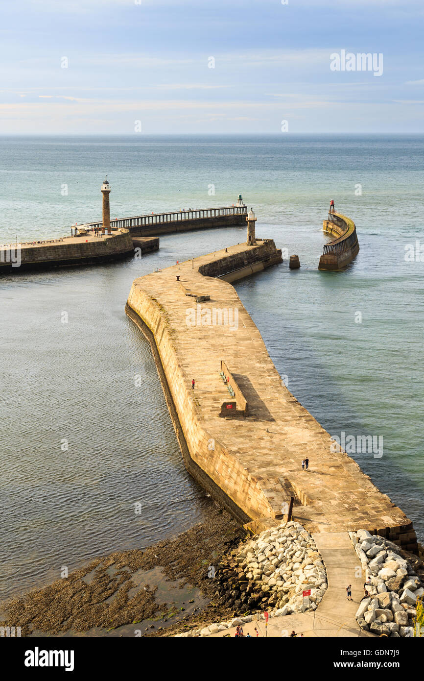 The West Lighthouse (left of image) and the East Lighthouse. In Whitby ...