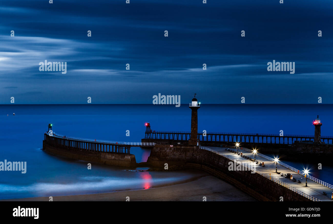 The West Lighthouse and pier, at night. Long exposure. In Whitby Stock ...