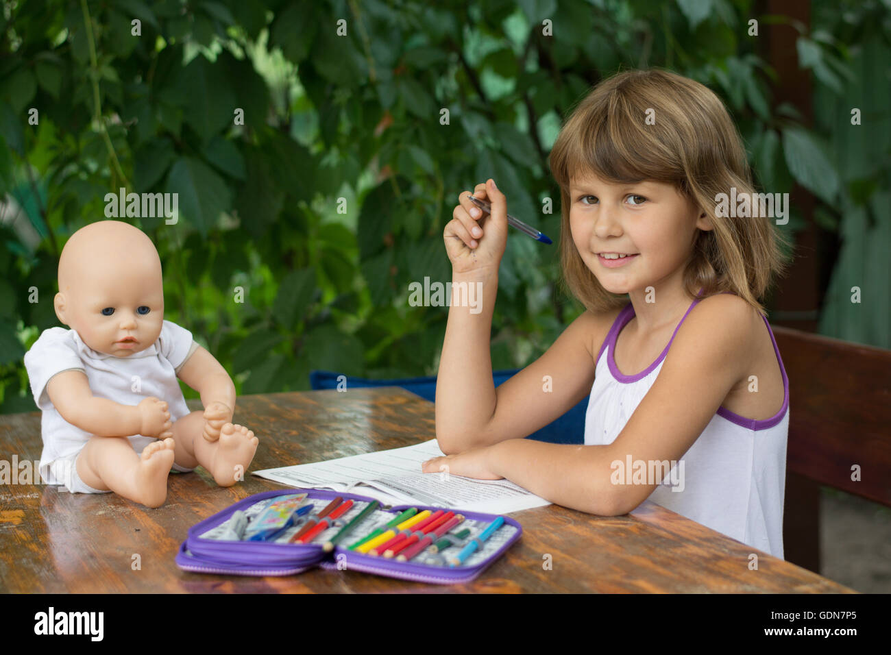 cute girl making lessons Stock Photo - Alamy