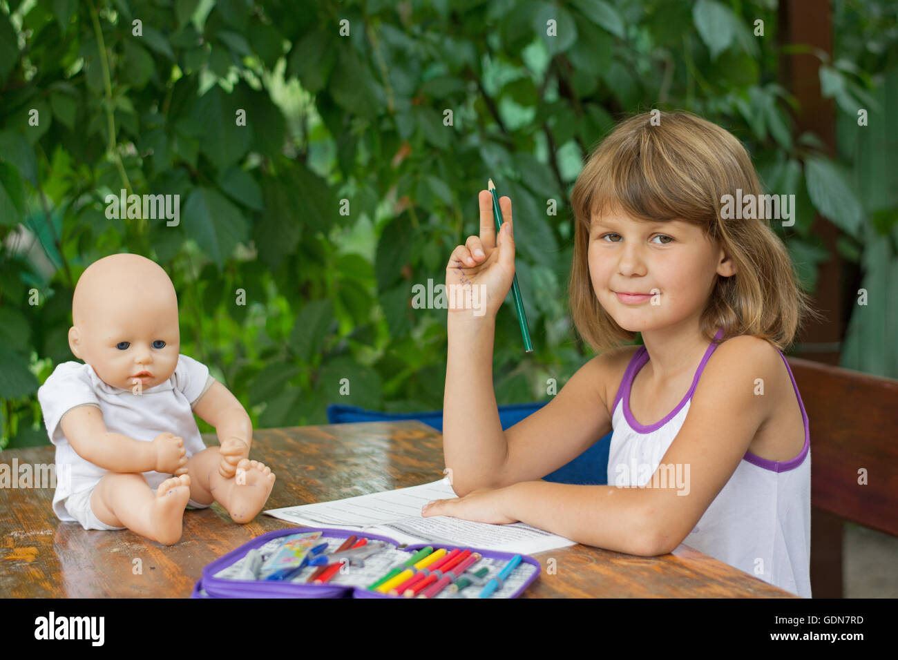 cute girl making lessons Stock Photo - Alamy
