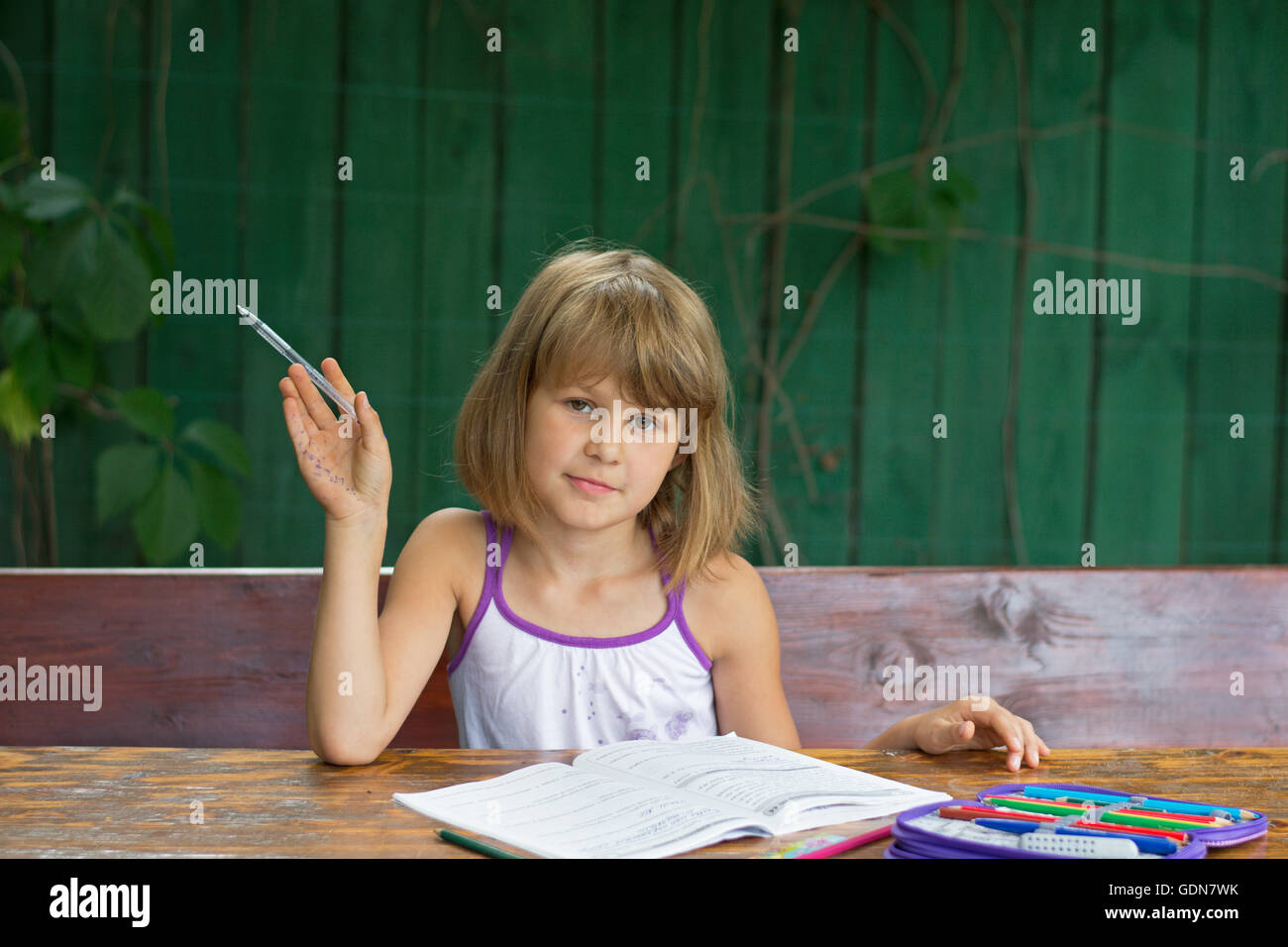 cute girl making lessons Stock Photo - Alamy