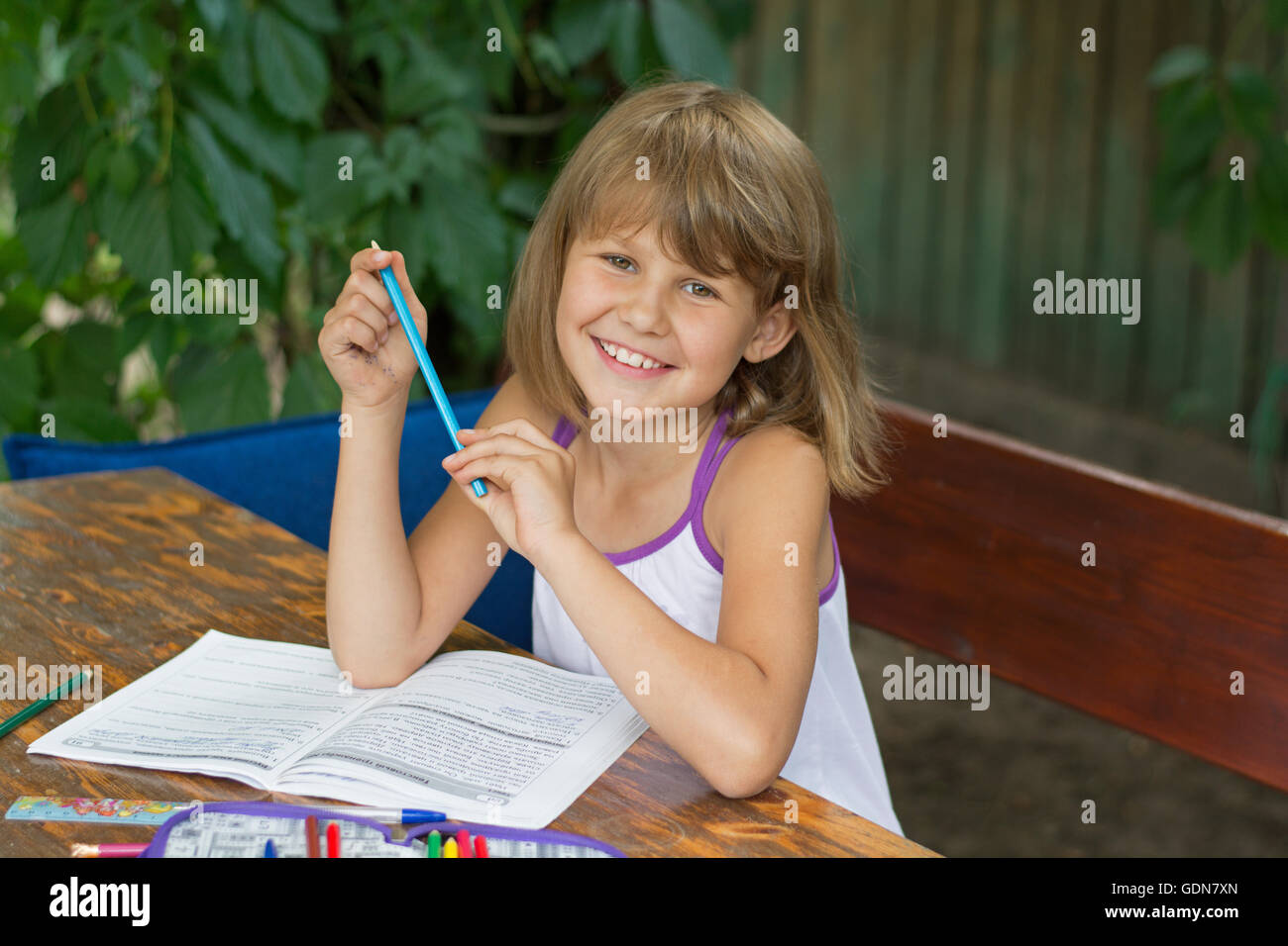 cute girl making lessons Stock Photo - Alamy