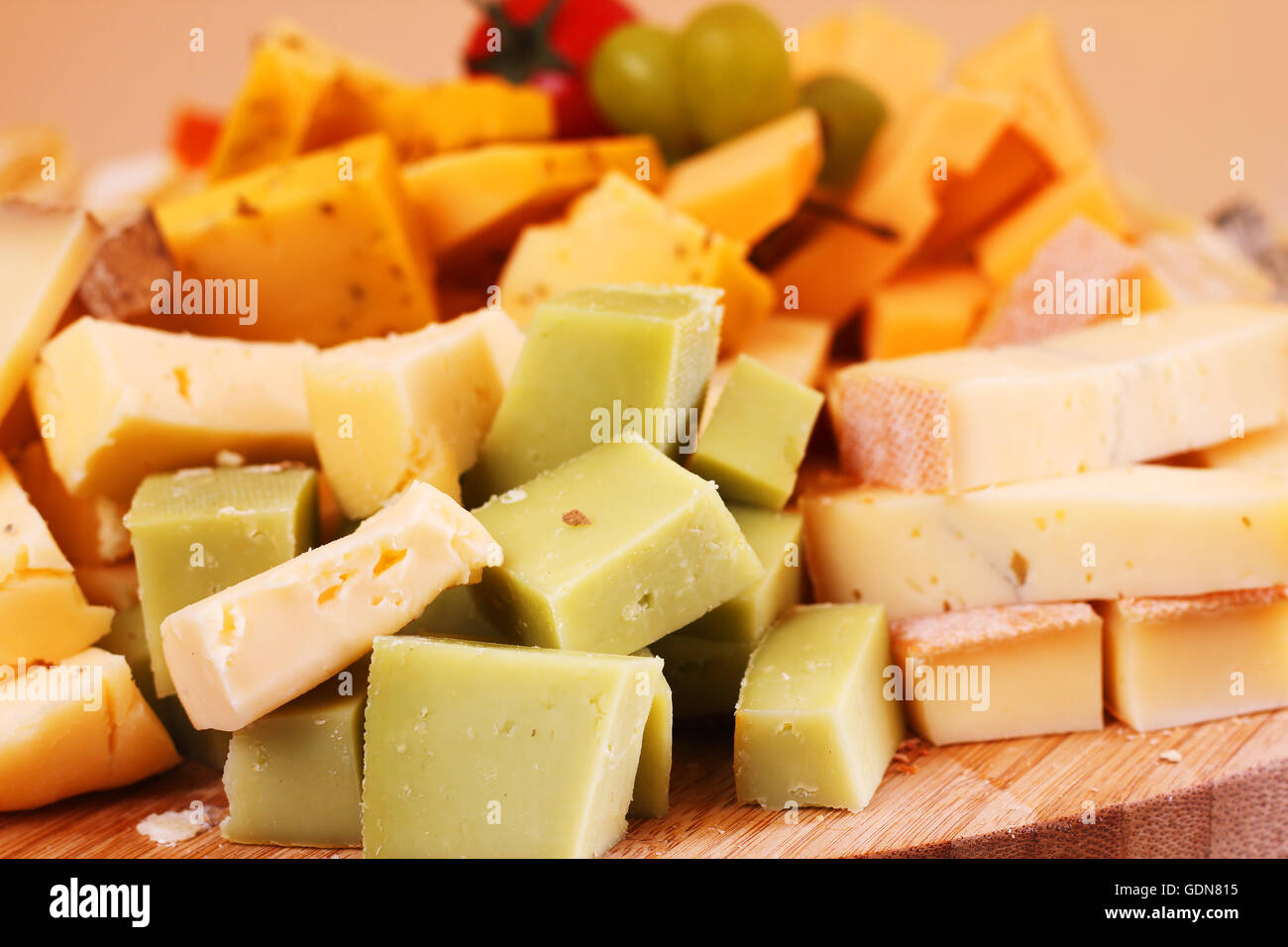 Cut french cheese blocks background close-up Stock Photo - Alamy