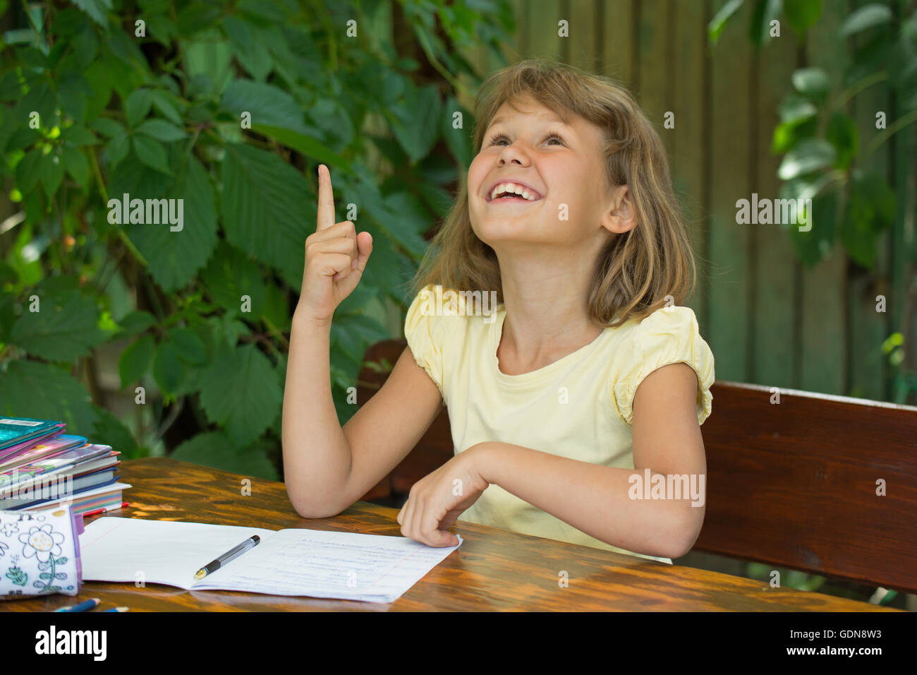 cute girl making lessons Stock Photo - Alamy