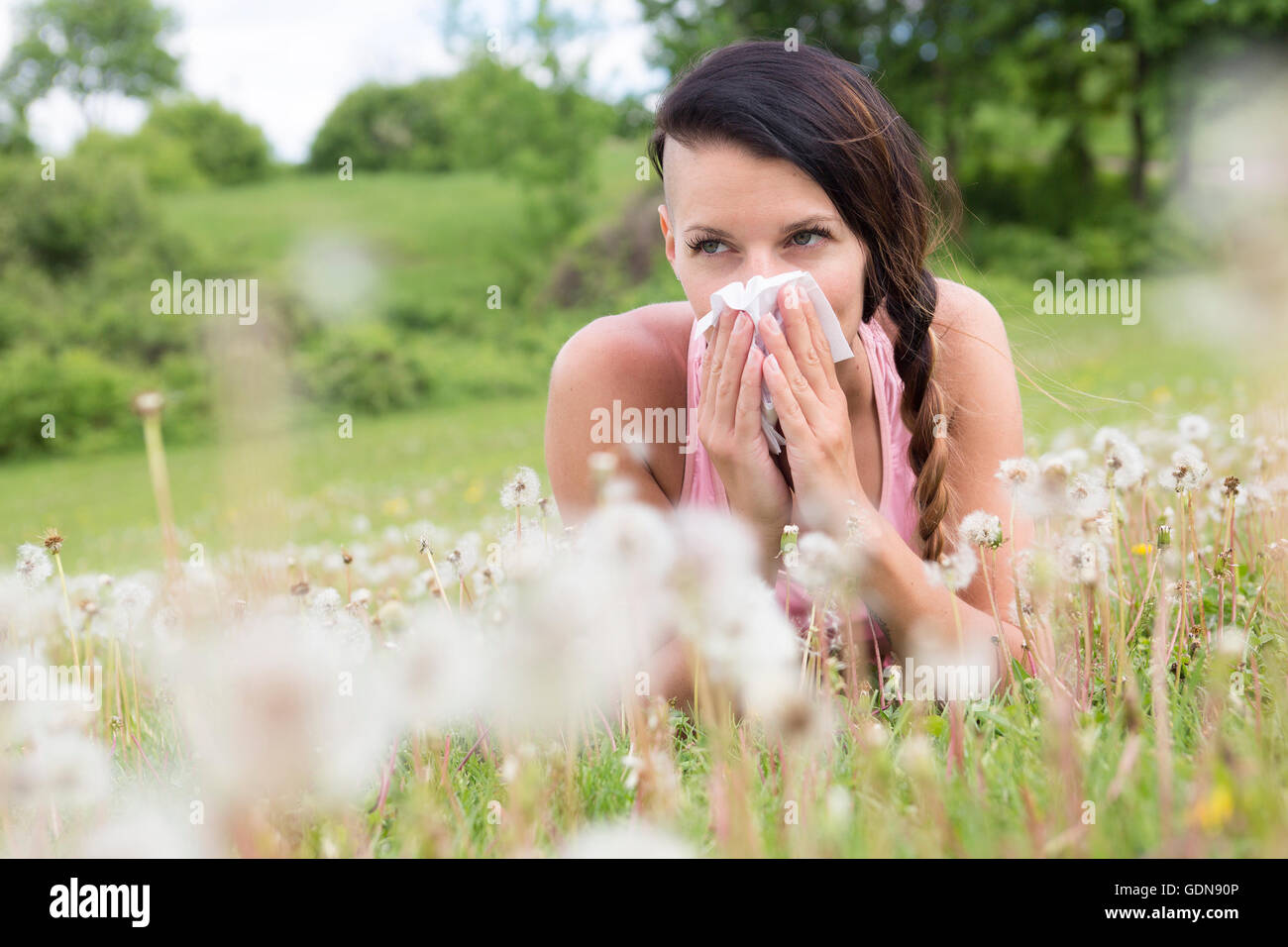 young woman suffering spring pollen allergy Stock Photo - Alamy