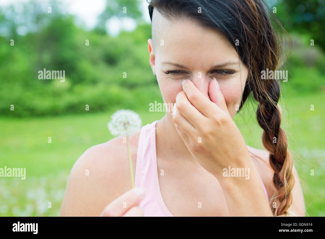 young woman suffering spring pollen allergy Stock Photo - Alamy
