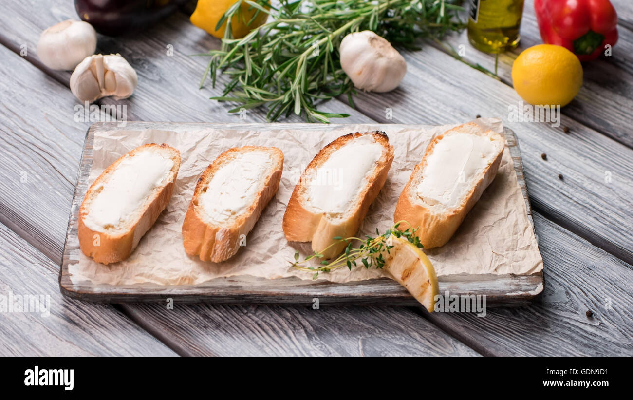 Pieces of bread with butter Stock Photo - Alamy