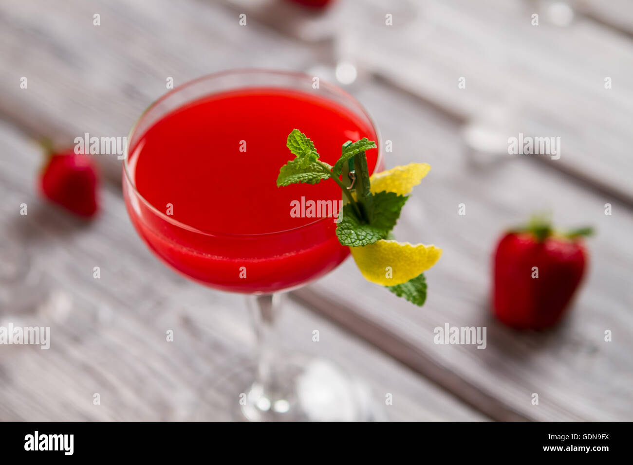 Bright red beverage in glass Stock Photo - Alamy