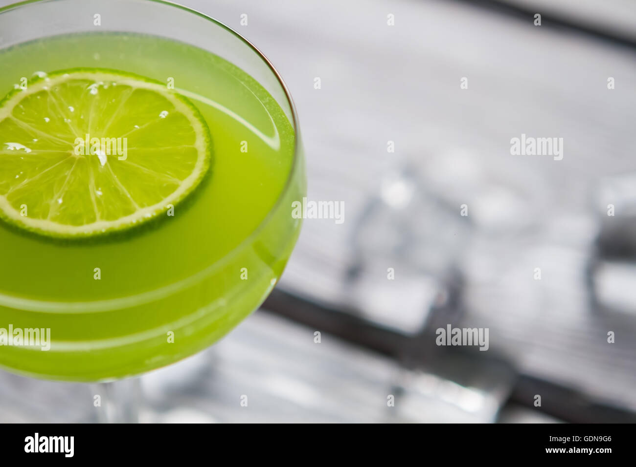 Glass with green drink Stock Photo - Alamy