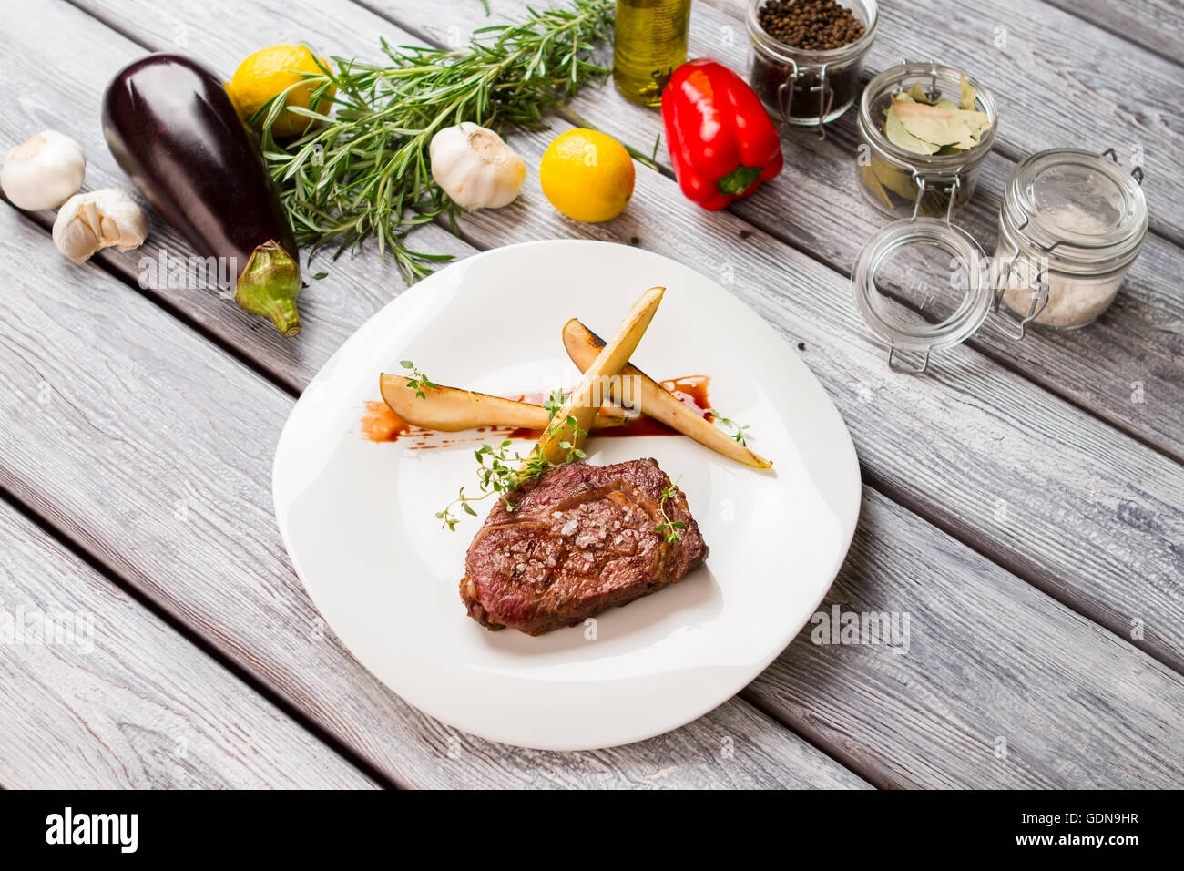 Cooked meat and raw vegetables Stock Photo - Alamy