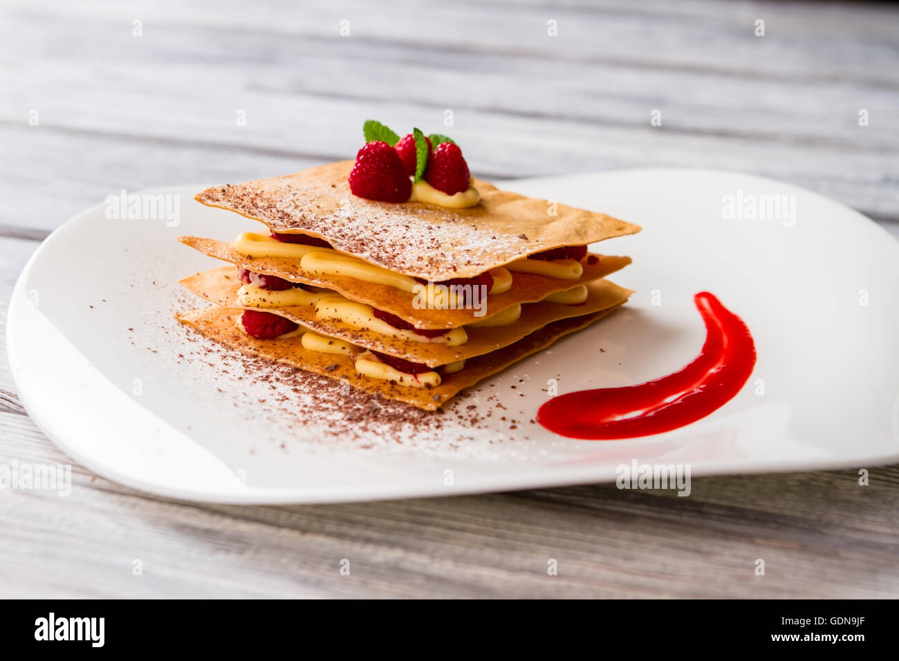 Dessert with yellow custard Stock Photo - Alamy