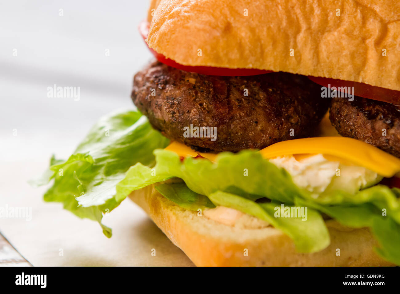 Burger with lettuce leaves Stock Photo - Alamy