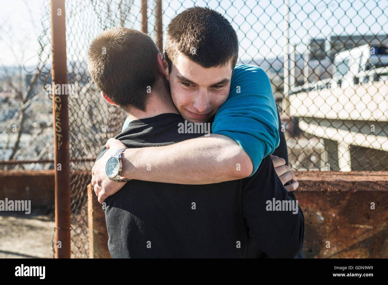 Boys Outside having fun together Stock Photo - Alamy