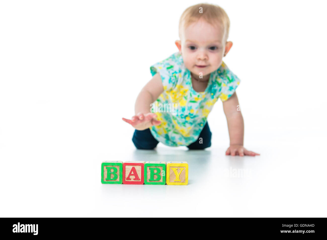 Happy kid playing toy blocks isolated on white background Stock Photo ...