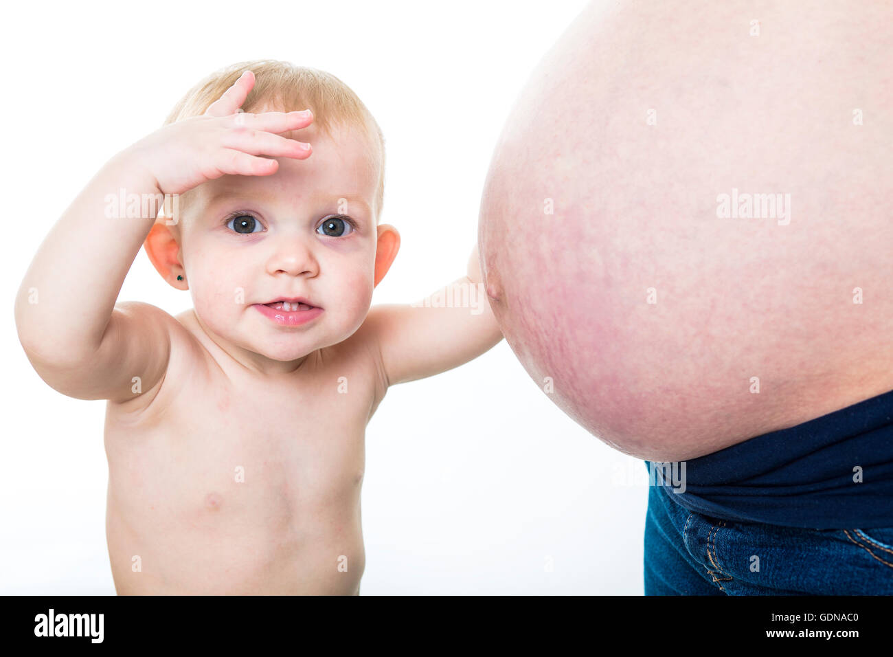 Infant child baby toddler pointing finger isolated on a white ...