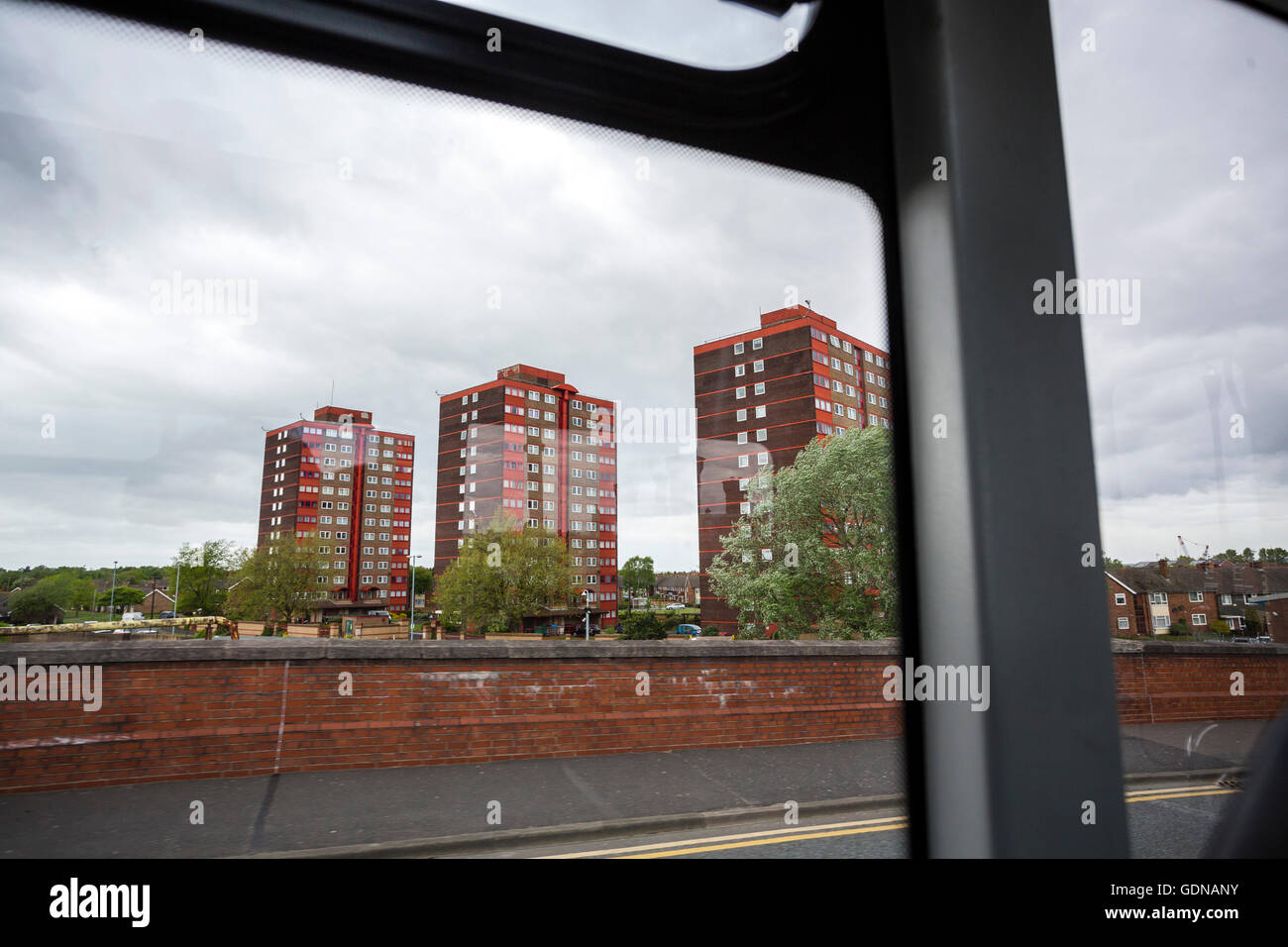 Blocks of flats seen through a bus window in Ellesmere Port, Uk Stock ...
