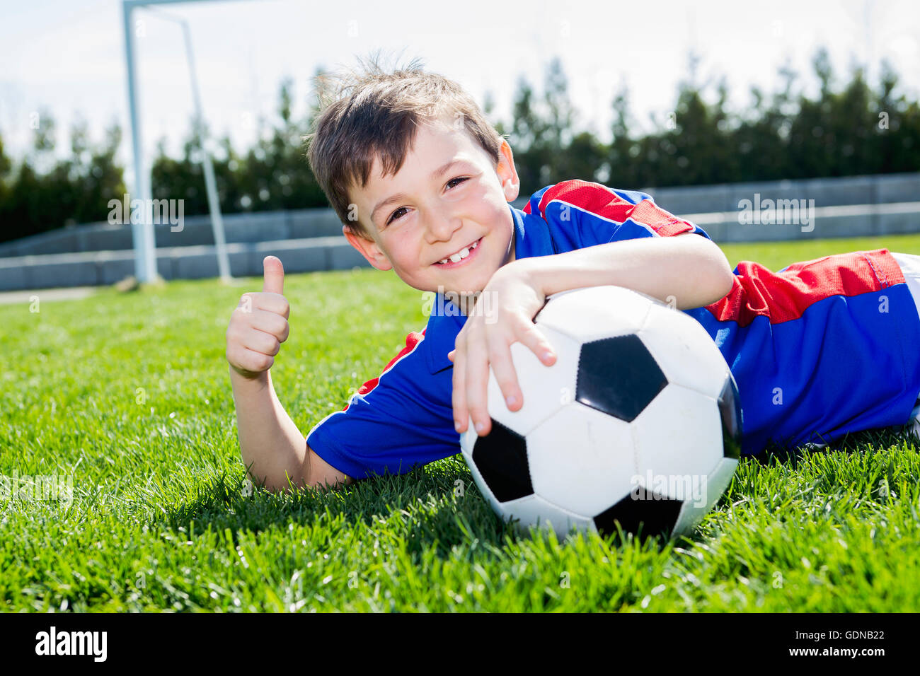 handsome teenager boy Football Stock Photo - Alamy
