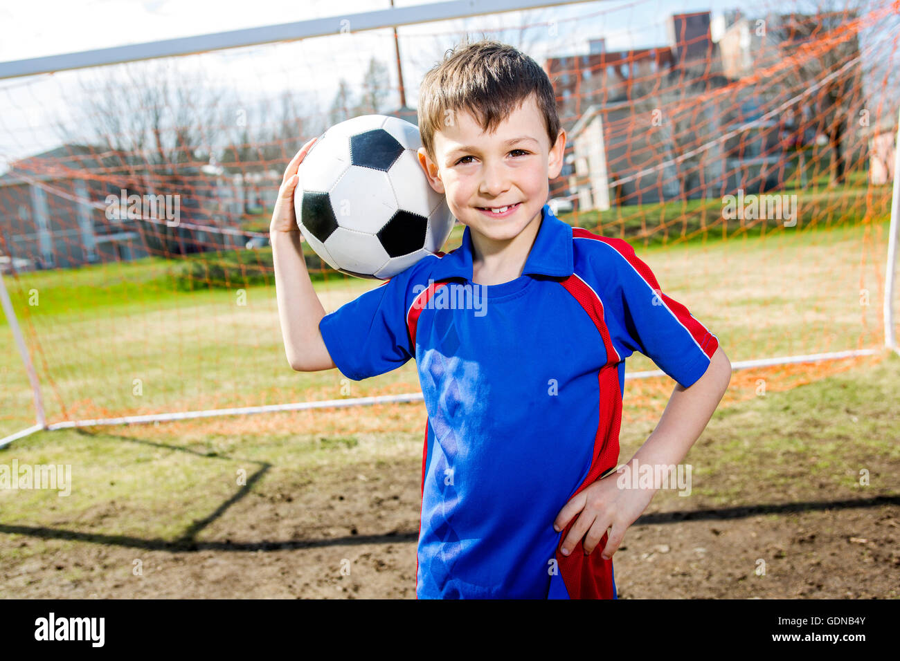 handsome teenager boy Football Stock Photo - Alamy