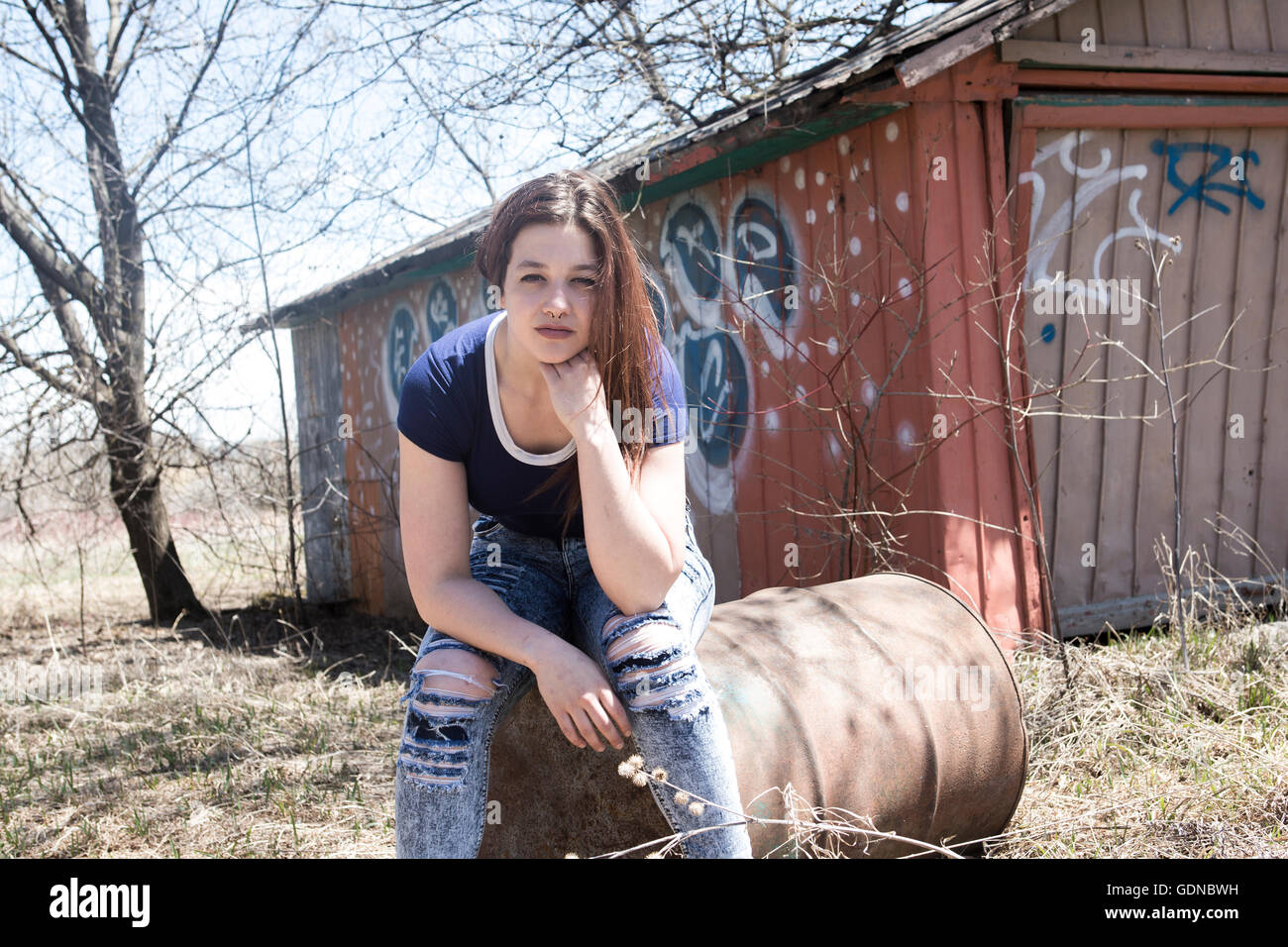 Girl by Old Barn Stock Photo - Alamy