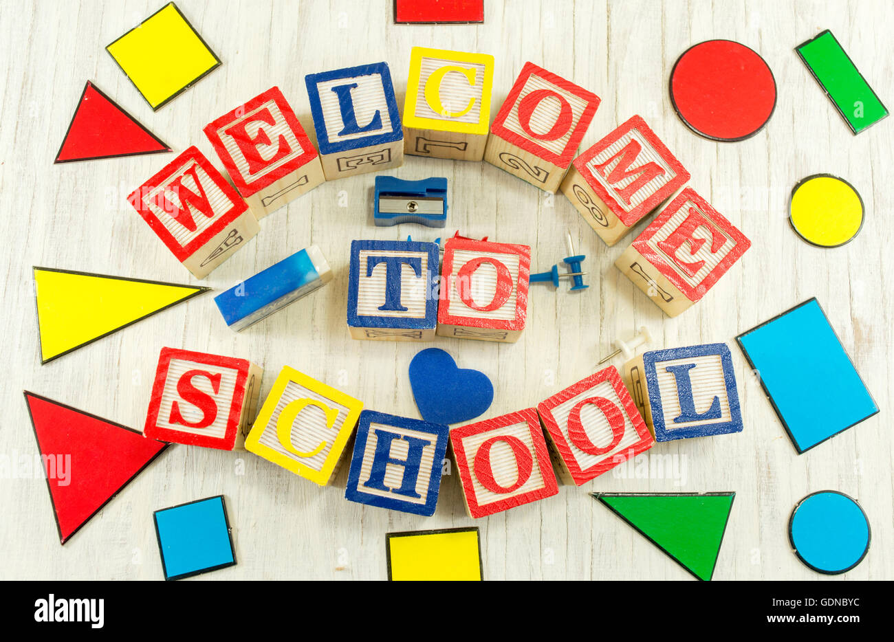 Welcome to school written with wooden cubicle letters Stock Photo - Alamy