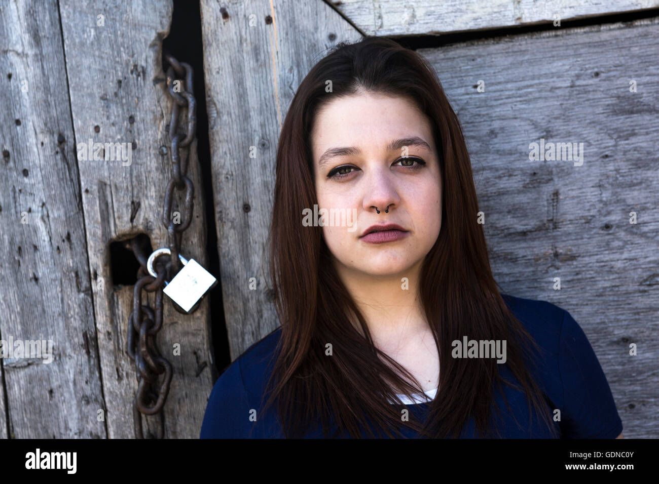 Girl by Old Barn Stock Photo - Alamy