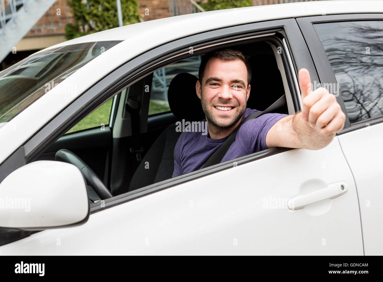 Young owner man with his car Stock Photo - Alamy