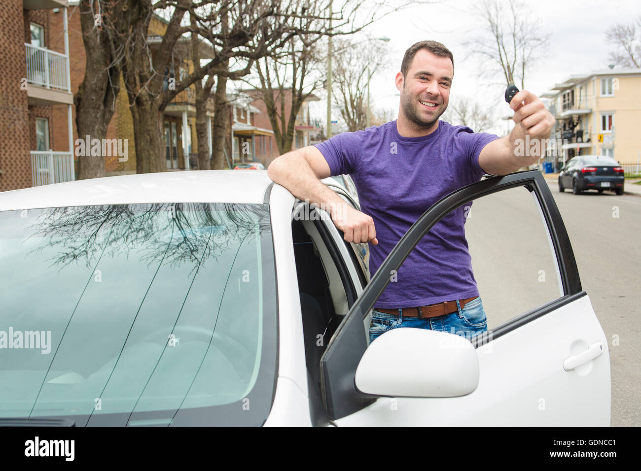 Young owner man with his car Stock Photo - Alamy