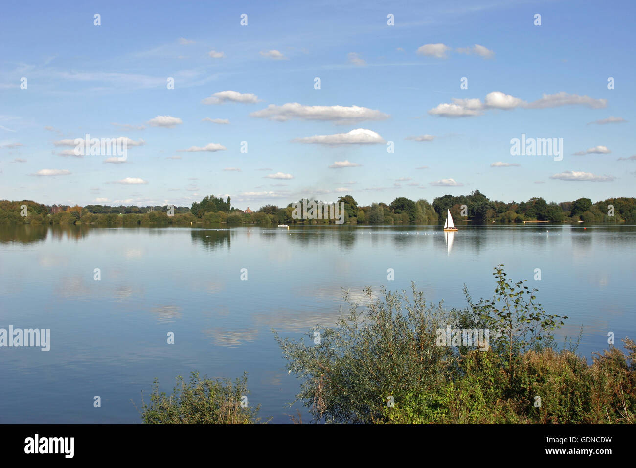 Reservoir with sailing yacht Stock Photo - Alamy