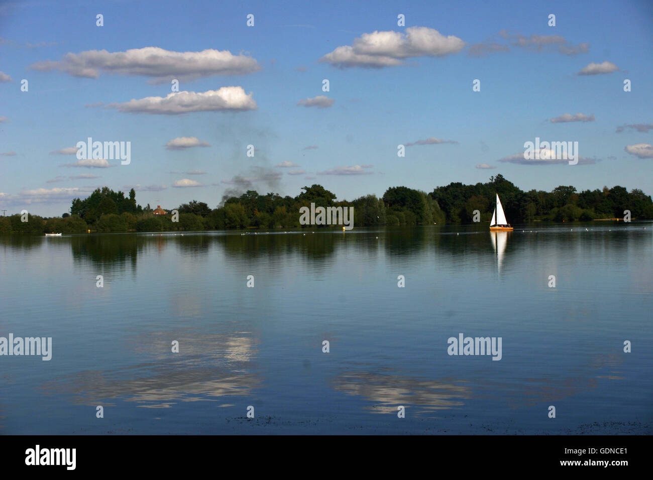 Reservoir with sailing yacht Stock Photo - Alamy