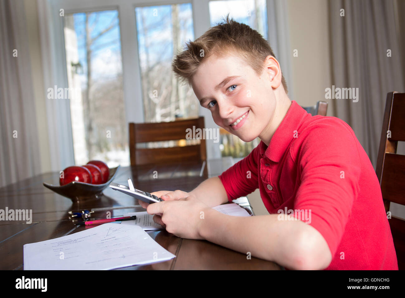 boy doing his homework at home Stock Photo - Alamy