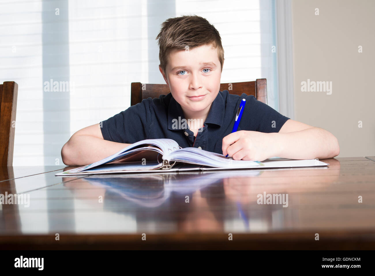 boy doing his homework at home Stock Photo - Alamy