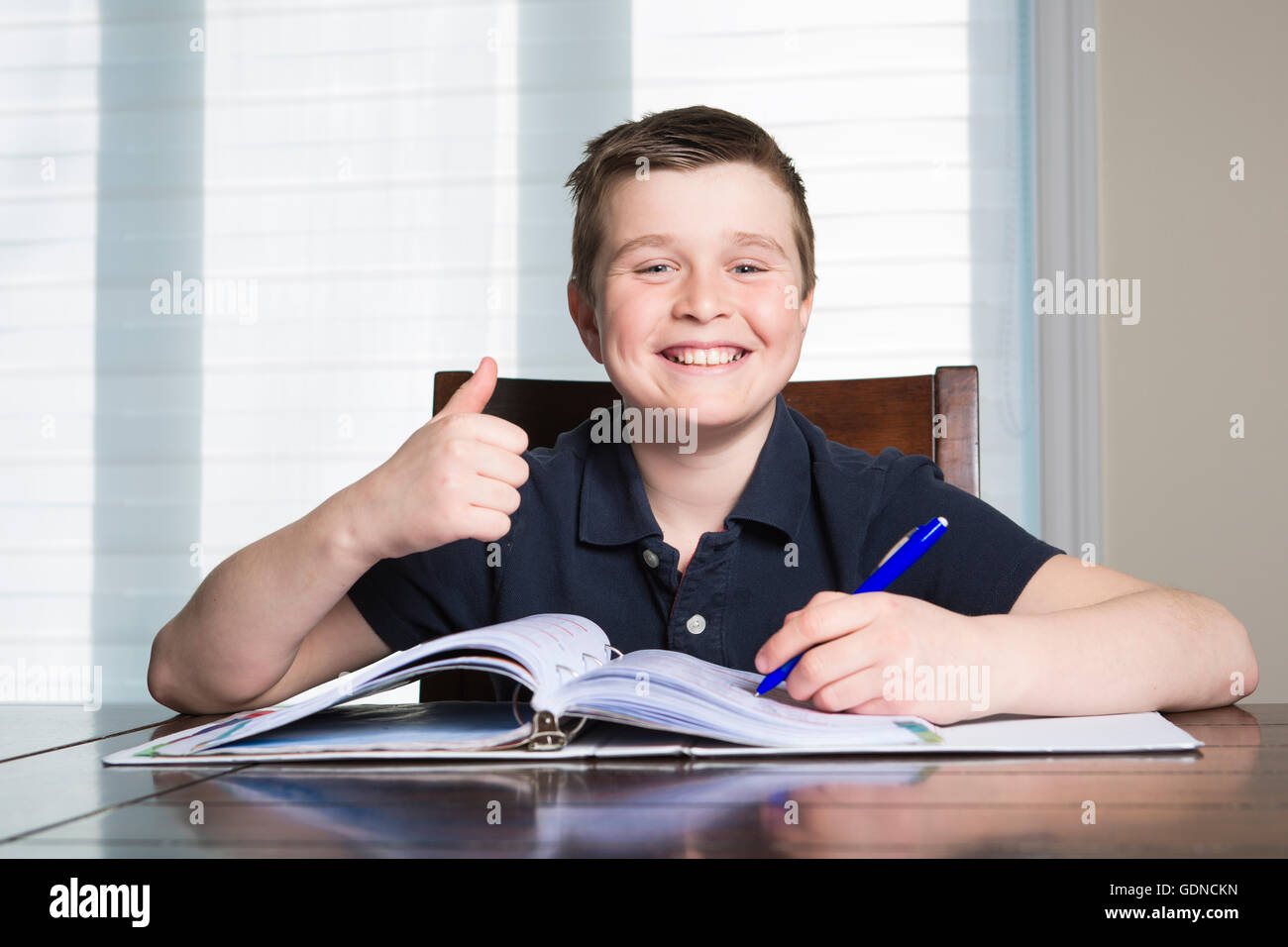 boy doing his homework at home Stock Photo - Alamy