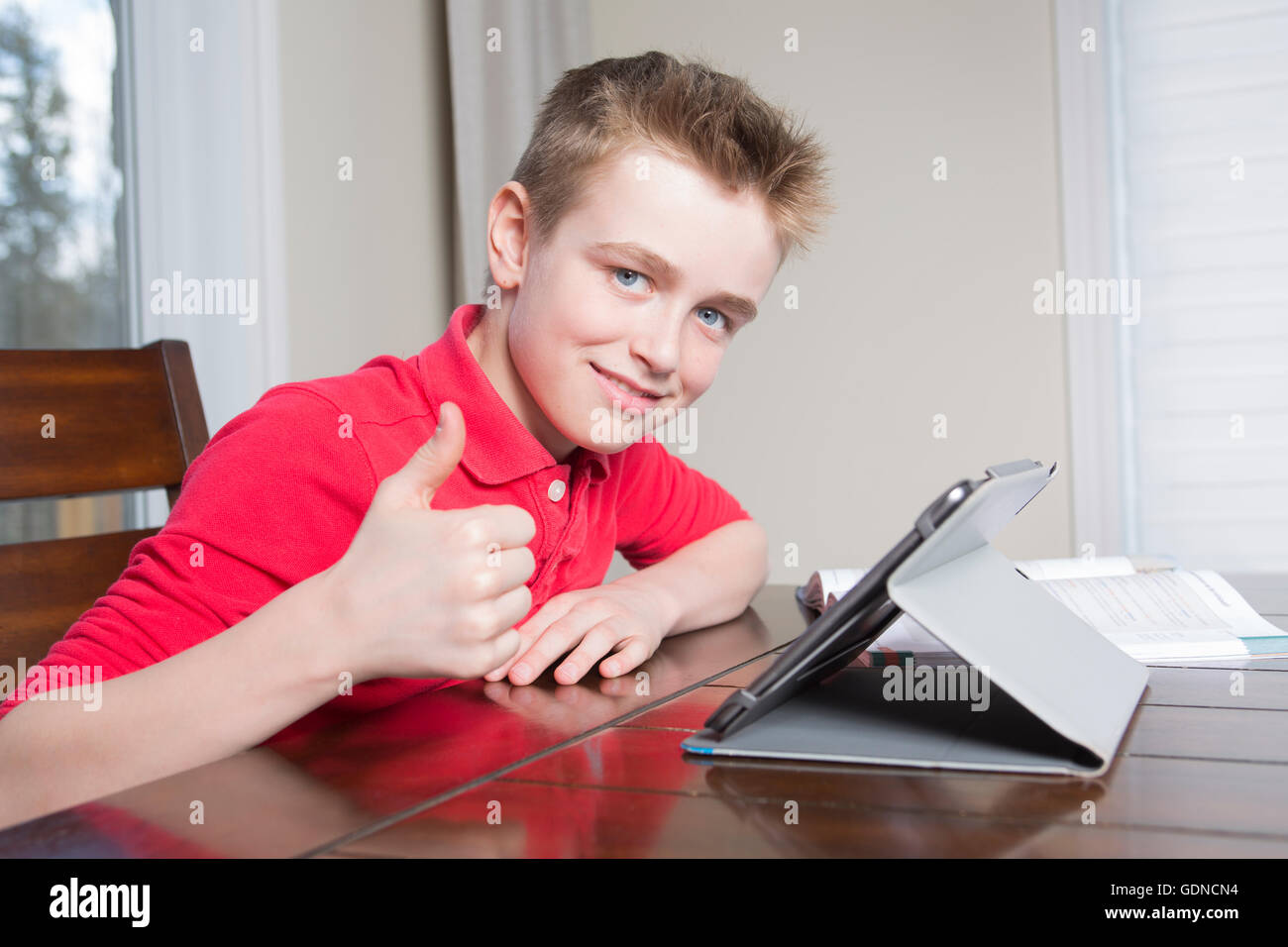 boy doing his homework at home Stock Photo - Alamy