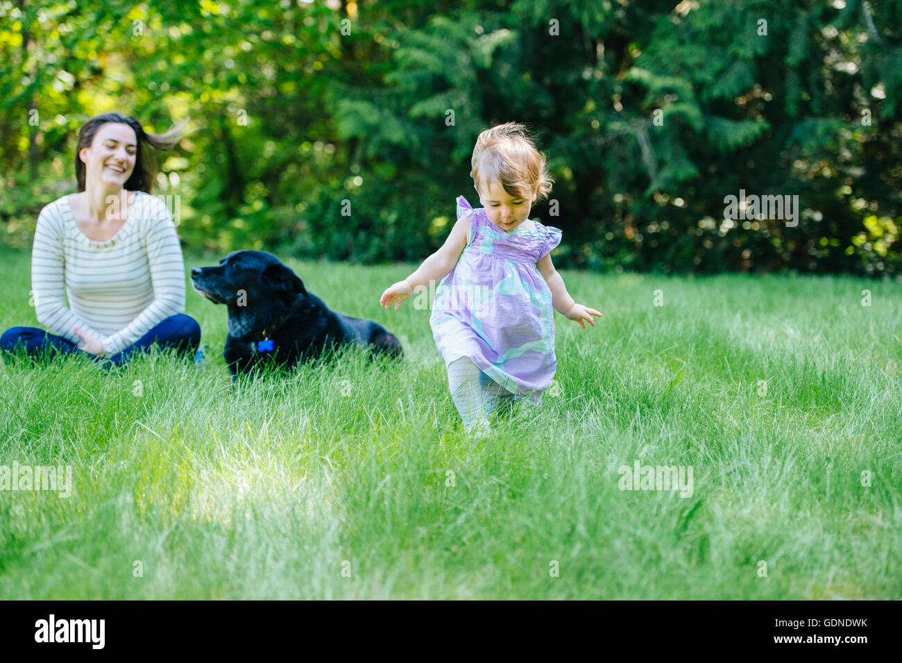 Woman in dress running away hi-res stock photography and images - Alamy