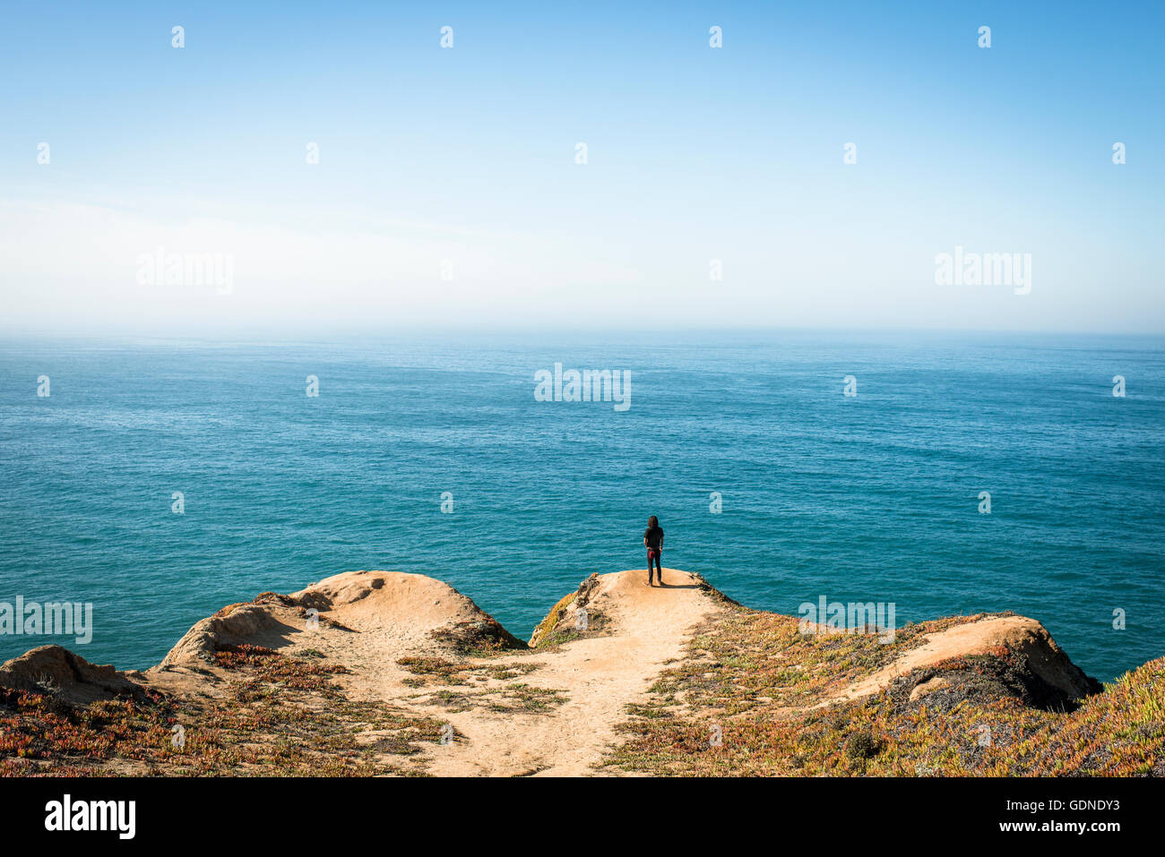 Man looking out over water hi-res stock photography and images - Alamy