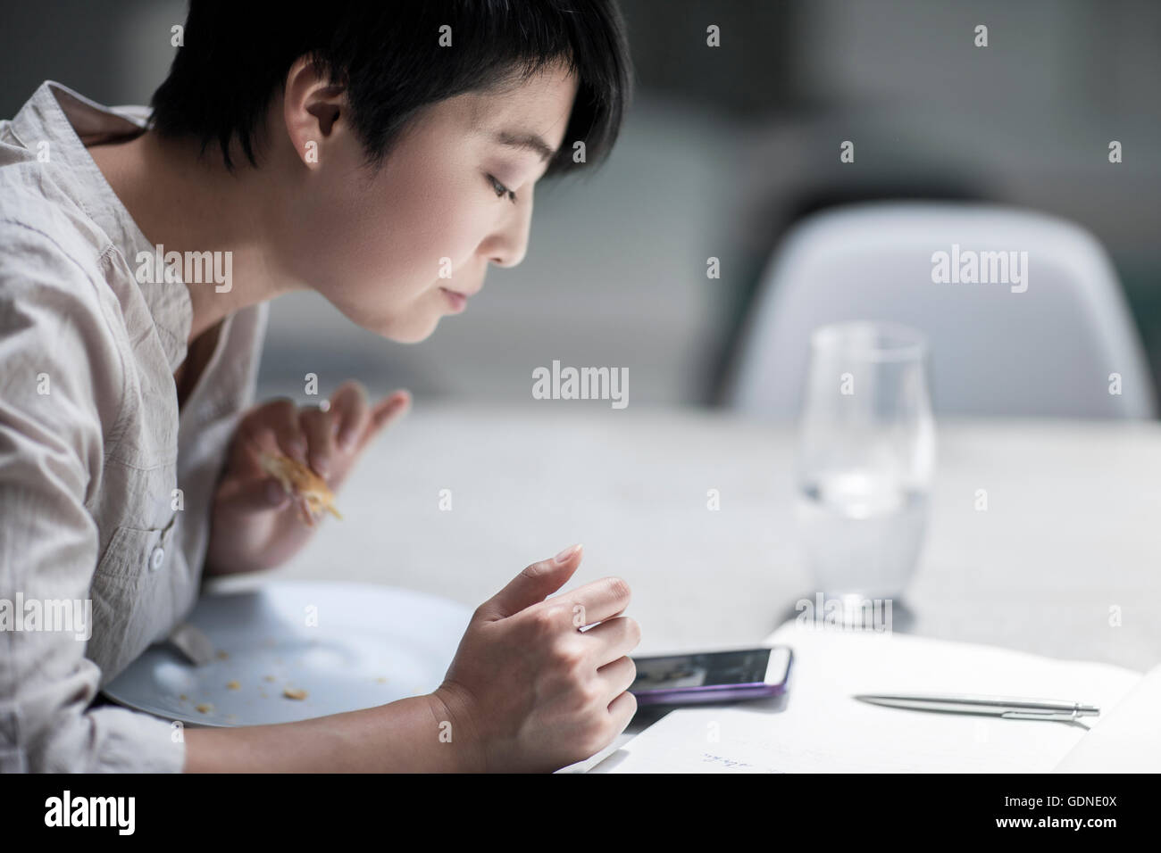 Top down woman eating reading hi-res stock photography and images - Alamy