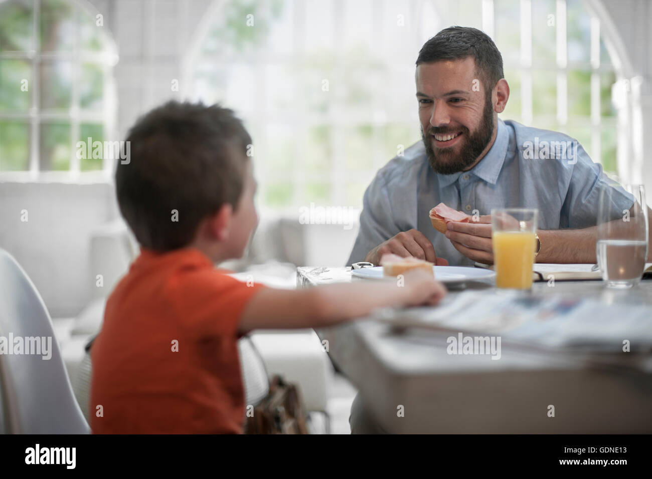Parent son chatting hi-res stock photography and images - Alamy