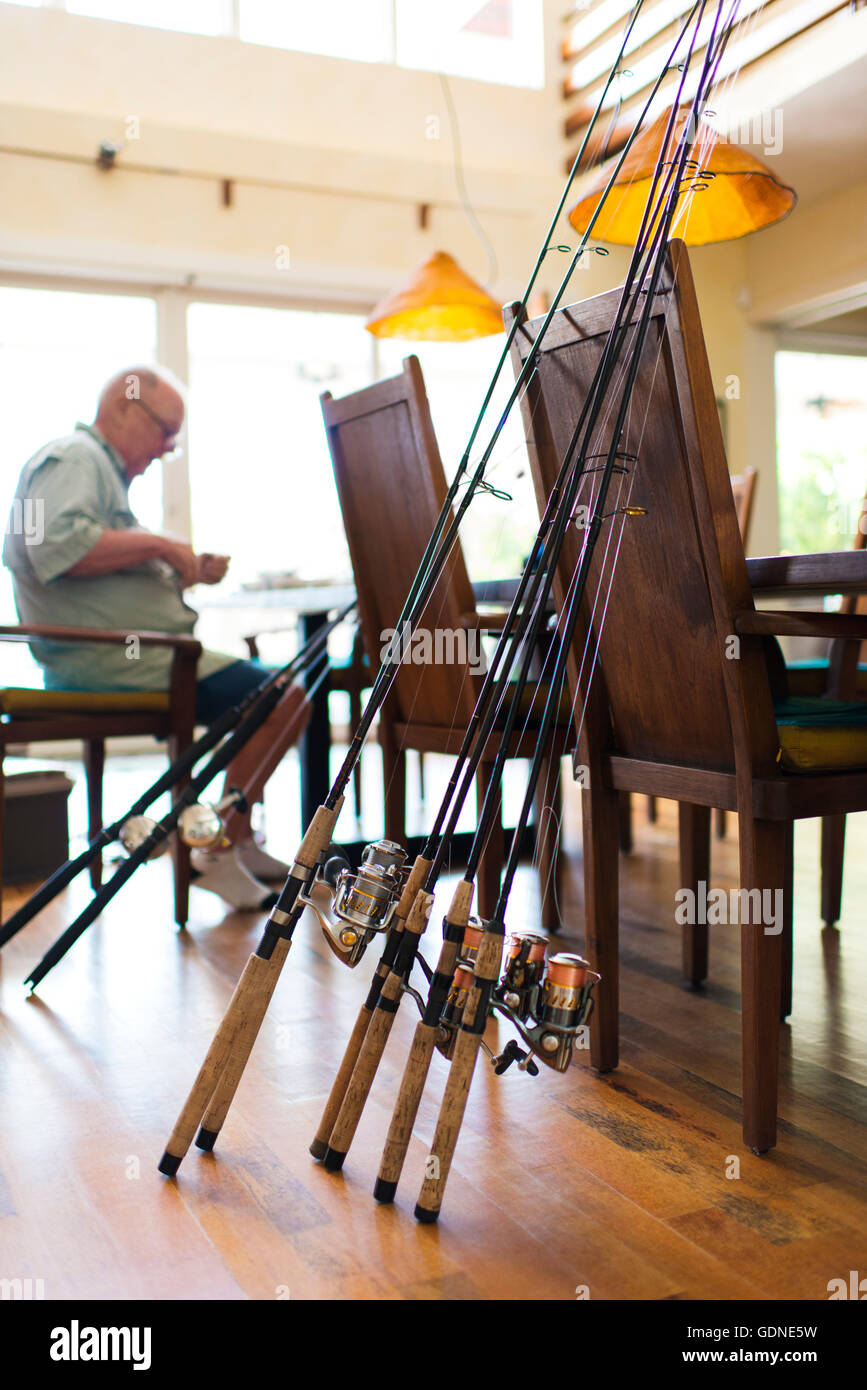 Man sitting in chair fishing hi-res stock photography and images - Alamy