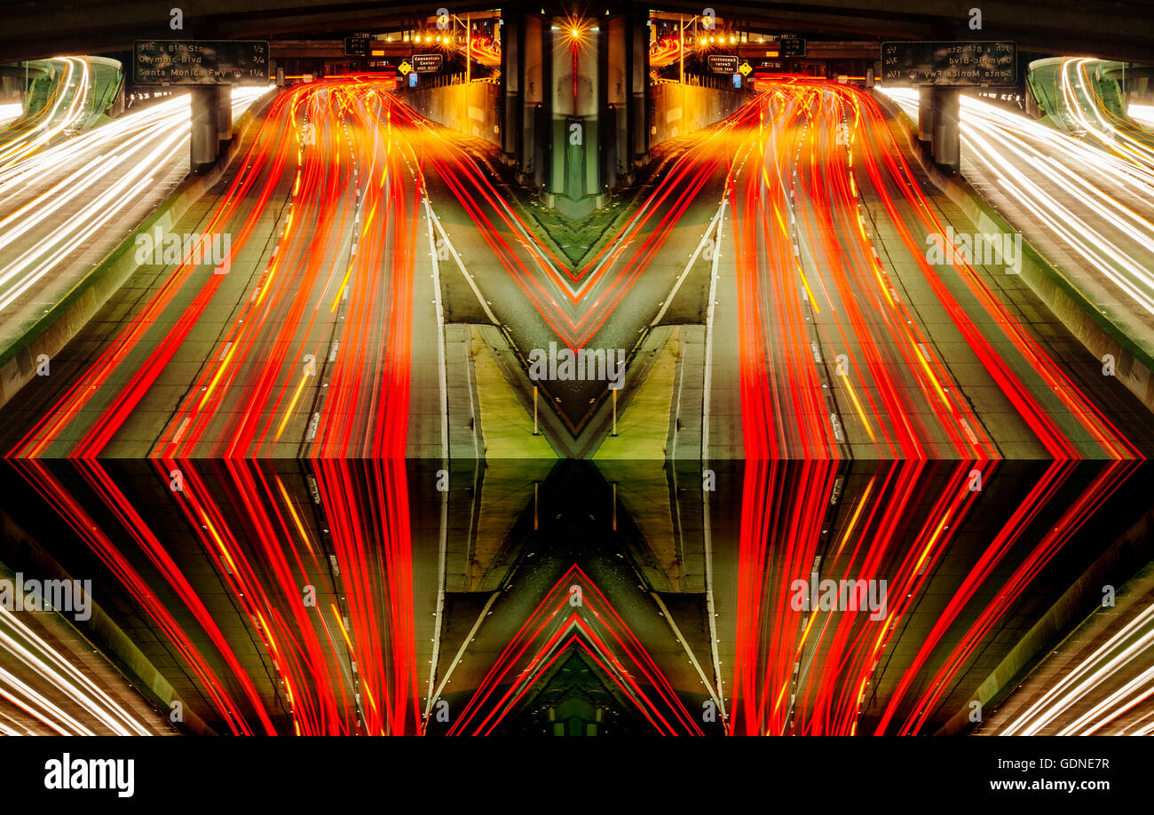 Abstract cityscape, mirror image of highway traffic light trails at ...