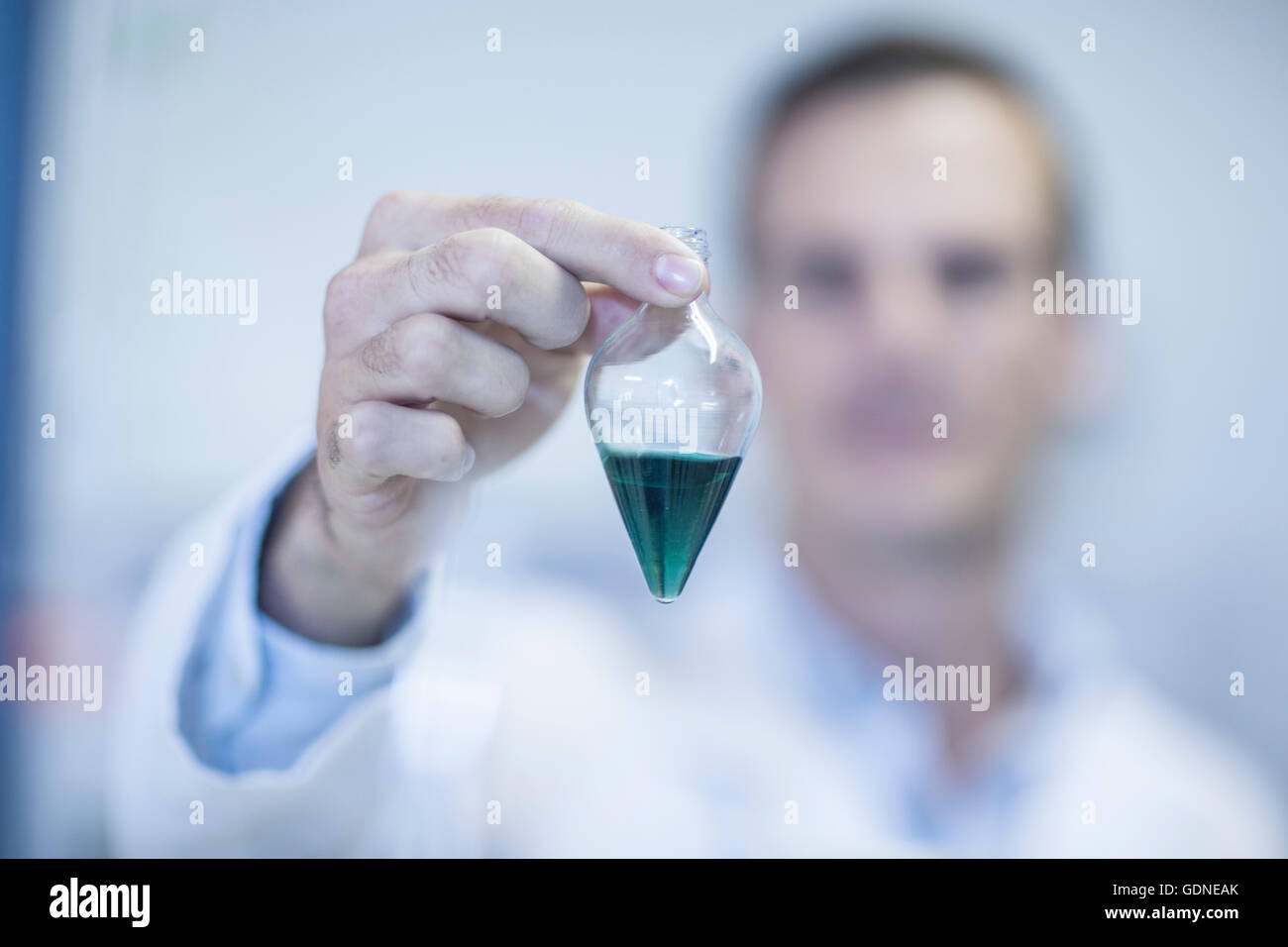 Man holding test tube hi-res stock photography and images - Alamy