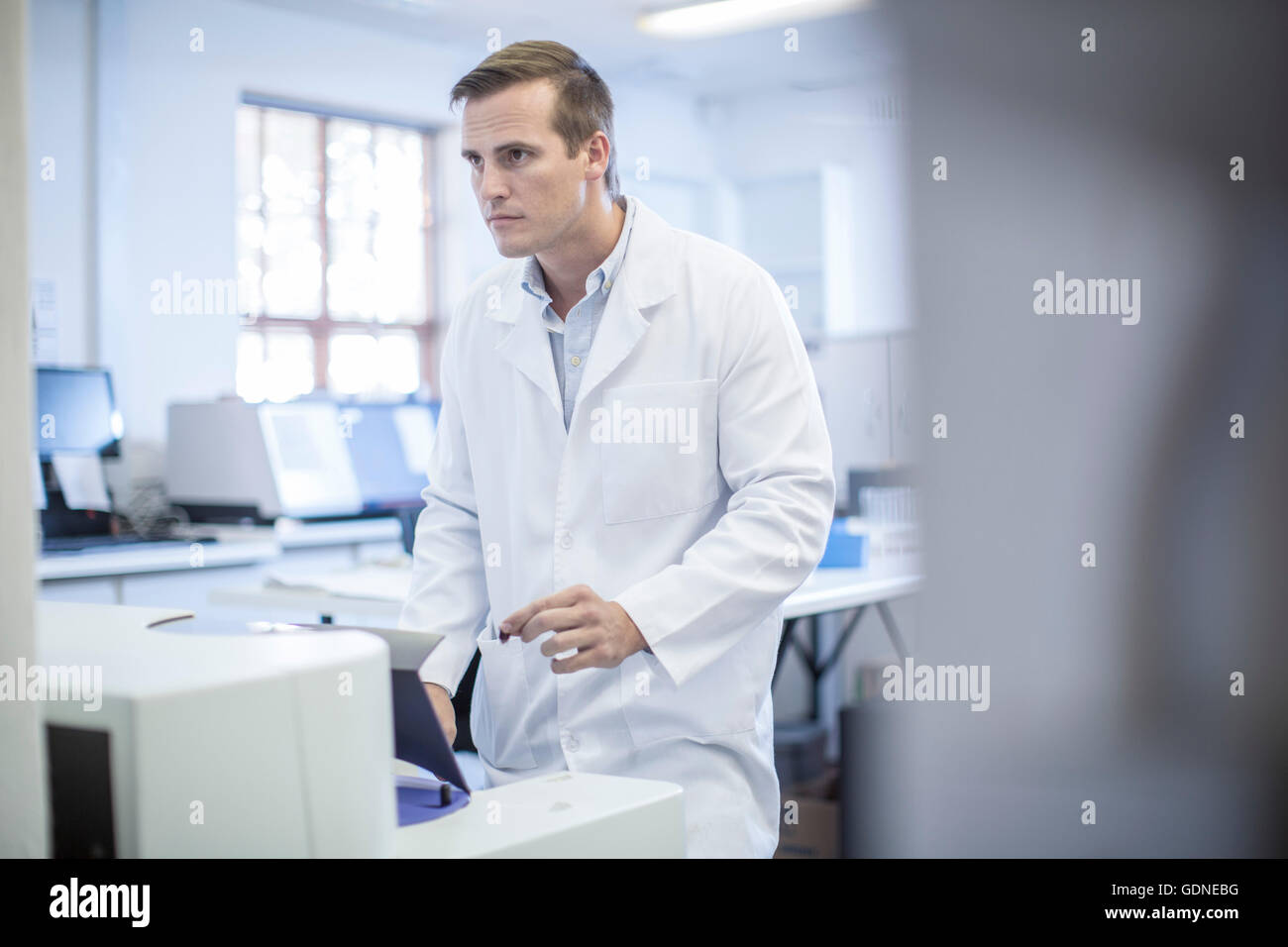 Man working in laboratory hi-res stock photography and images - Alamy