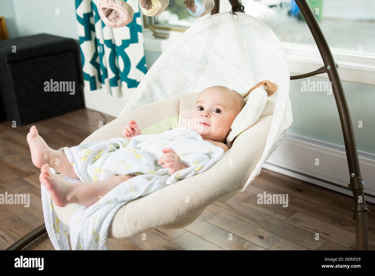 Baby inside the house having good time Stock Photo - Alamy