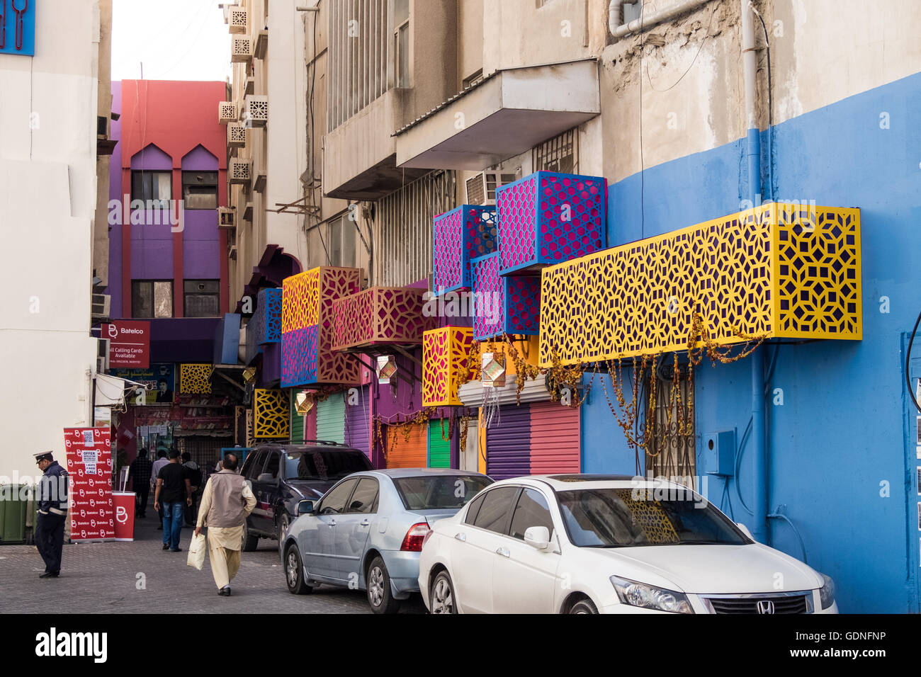 Multi colour painted old building on a street leading up to the Bab Al ...
