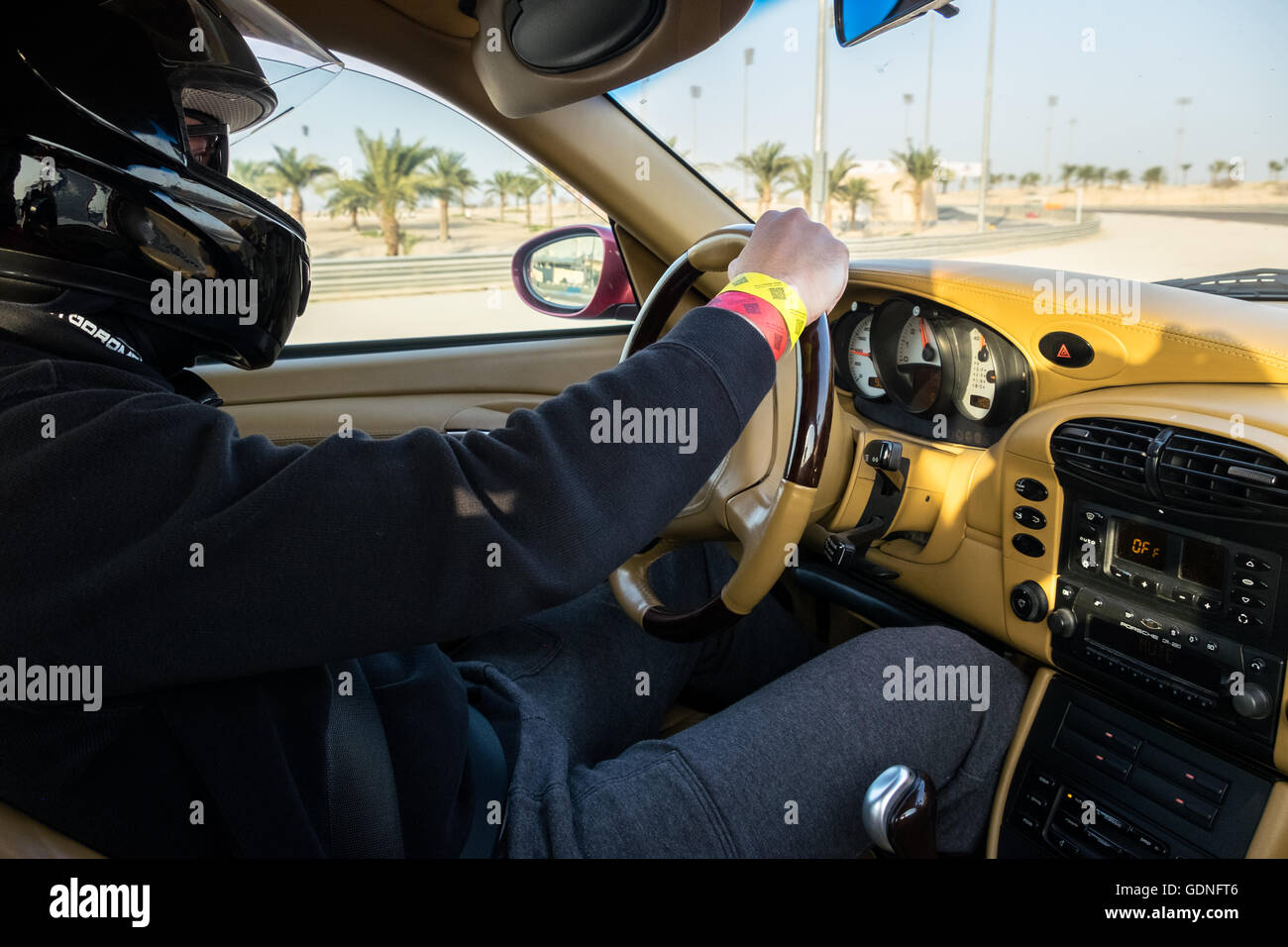 Race car driver in his car at the Bahrain Race Track Stock Photo - Alamy