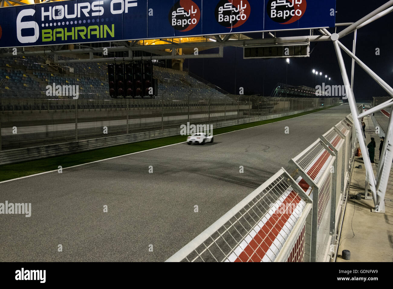 Sports car driving at the Bahrain Race Track Stock Photo - Alamy